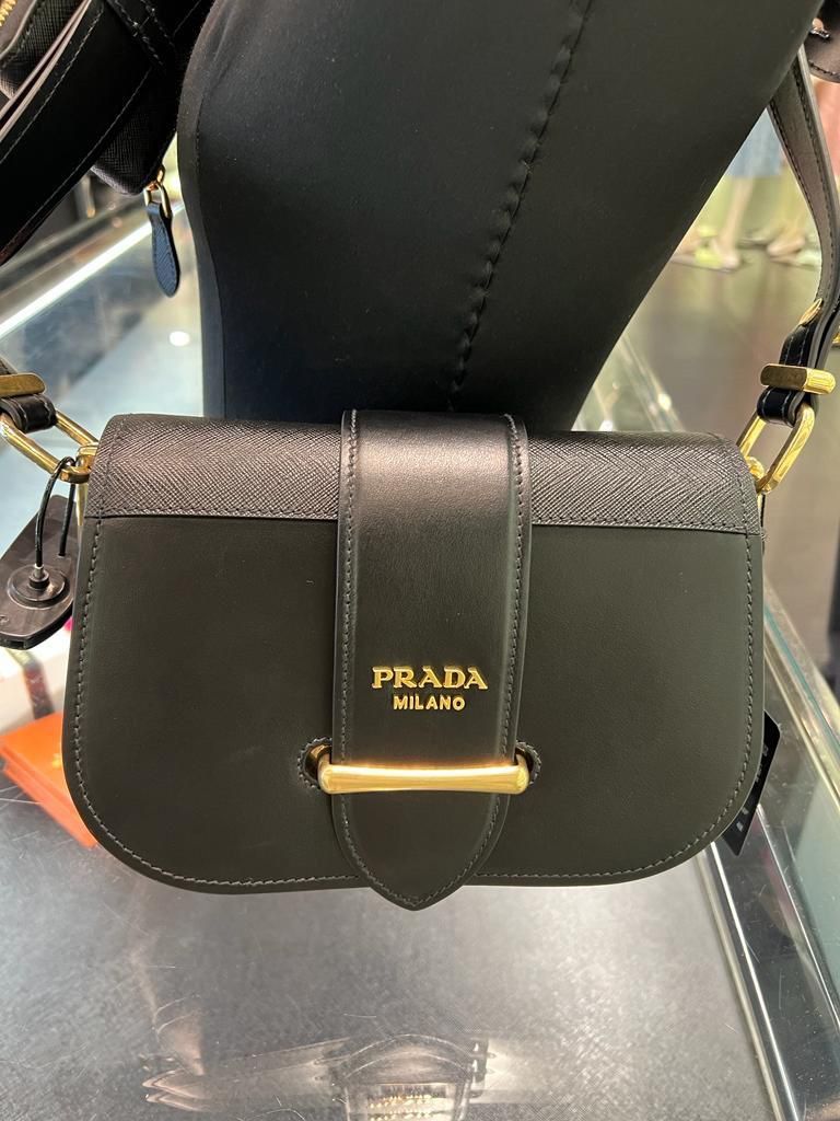 Prada little black bag Gold Buckel, Barang Mewah, Tas & Dompet di Carousell