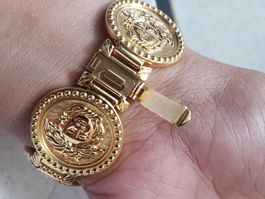 Versace medusa coins on Carousell