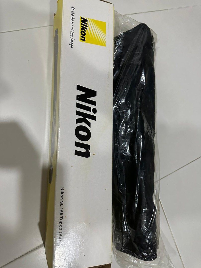 Nikon camera stand, Photography, Cameras on Carousell