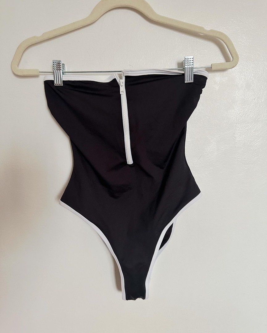 Skims swim zip up one piece on Carousell