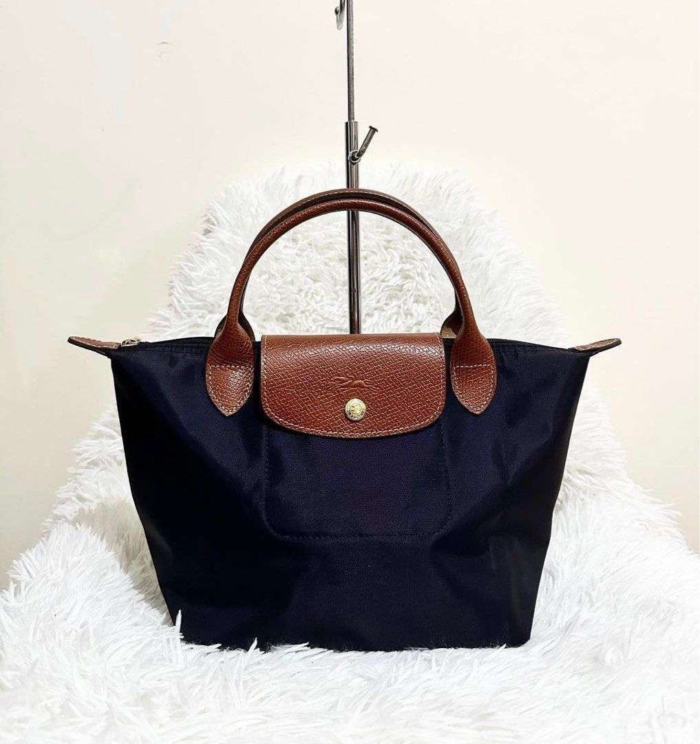 Original longchamp top handle in navy blue, Luxury, Bags & Wallets on ...