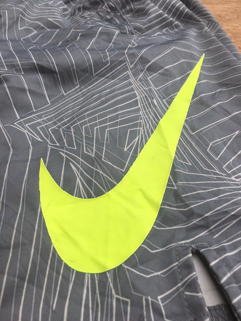 Nike aop ( neon green swoosh), Men's Fashion, Bottoms, Shorts on Carousell