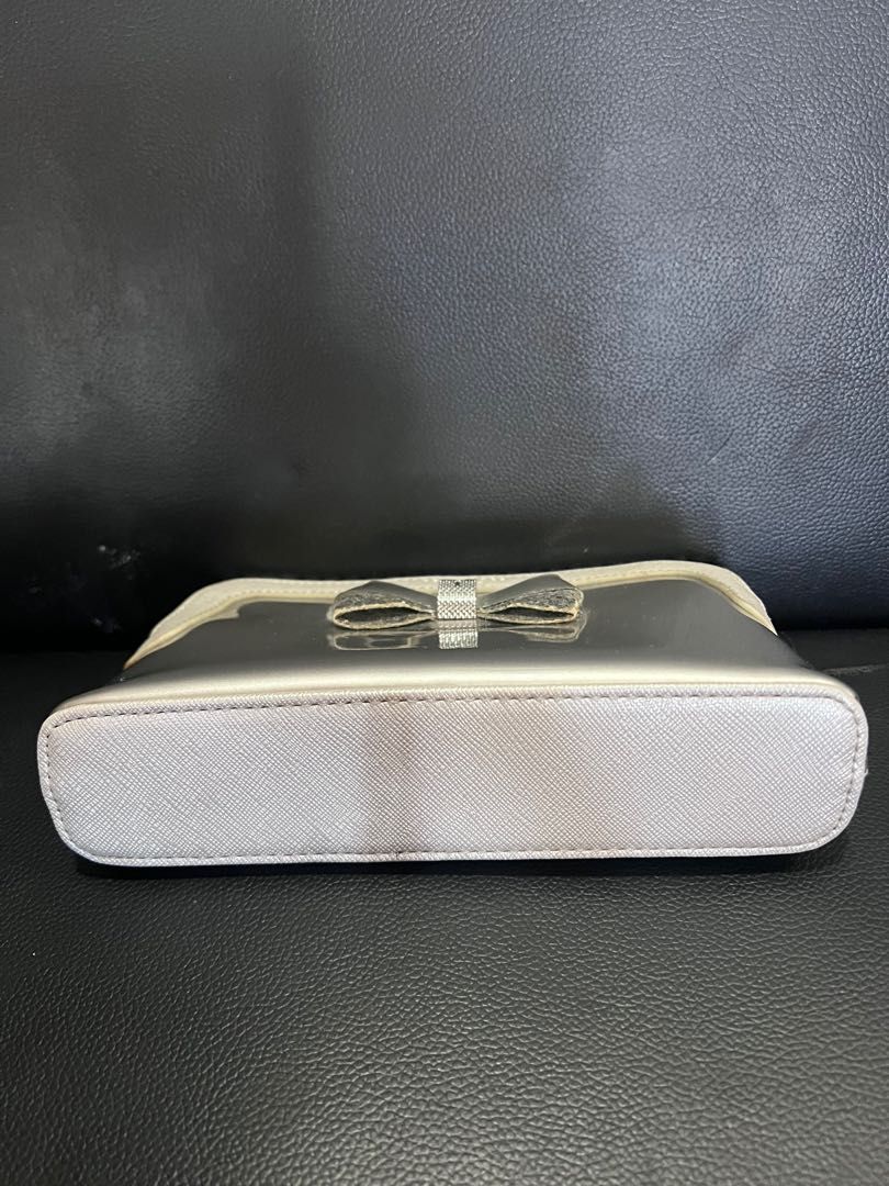 Ted Baker pouch on Carousell