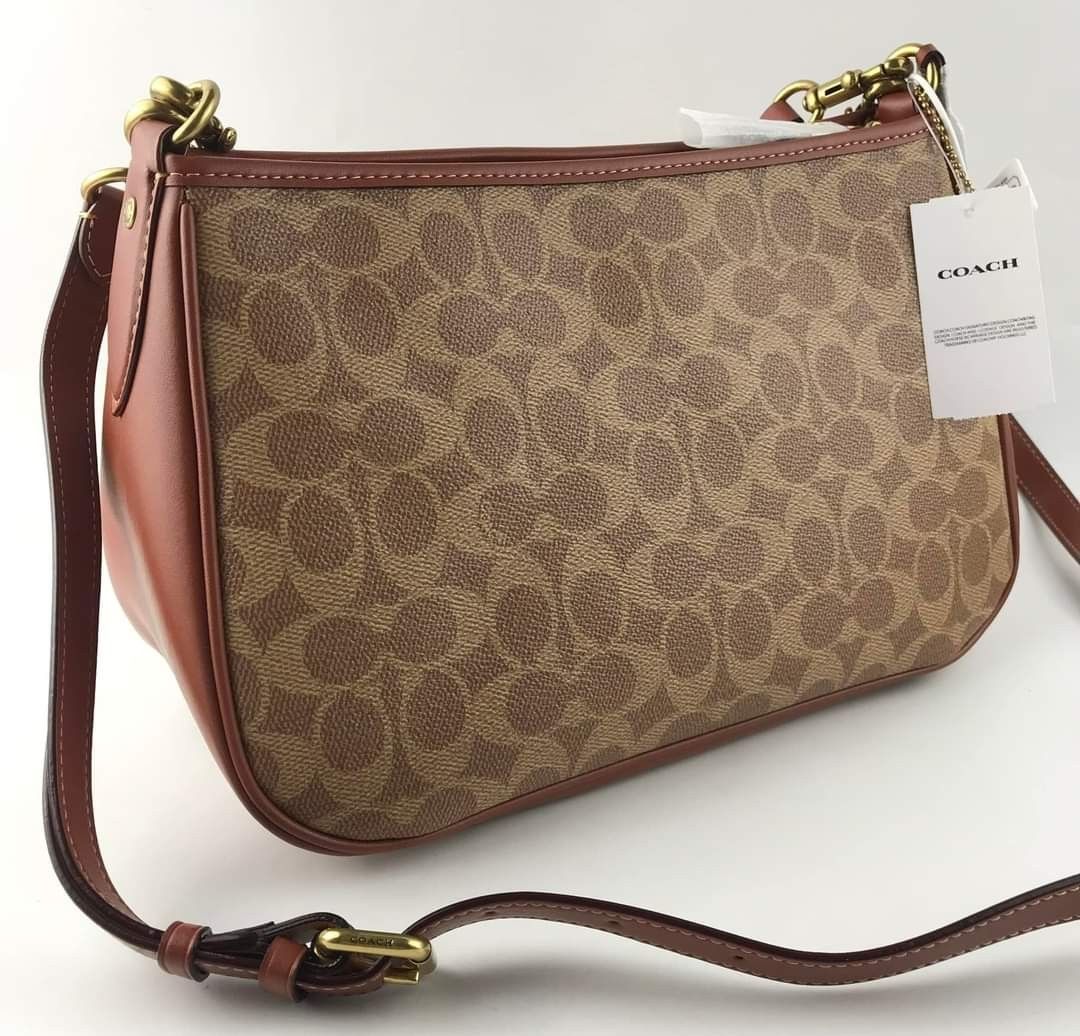Coach Cary Crossbody in Signature Canvas on Carousell