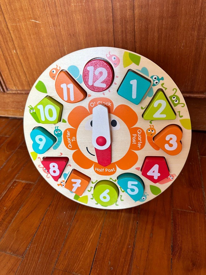 Hape Educational clock toy, Babies & Kids, Infant Playtime on Carousell