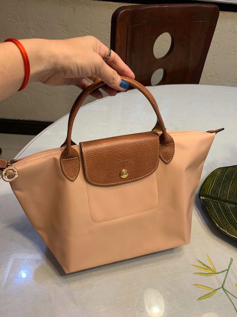 Original longchamp small top handle in peach, Luxury, Bags & Wallets on ...