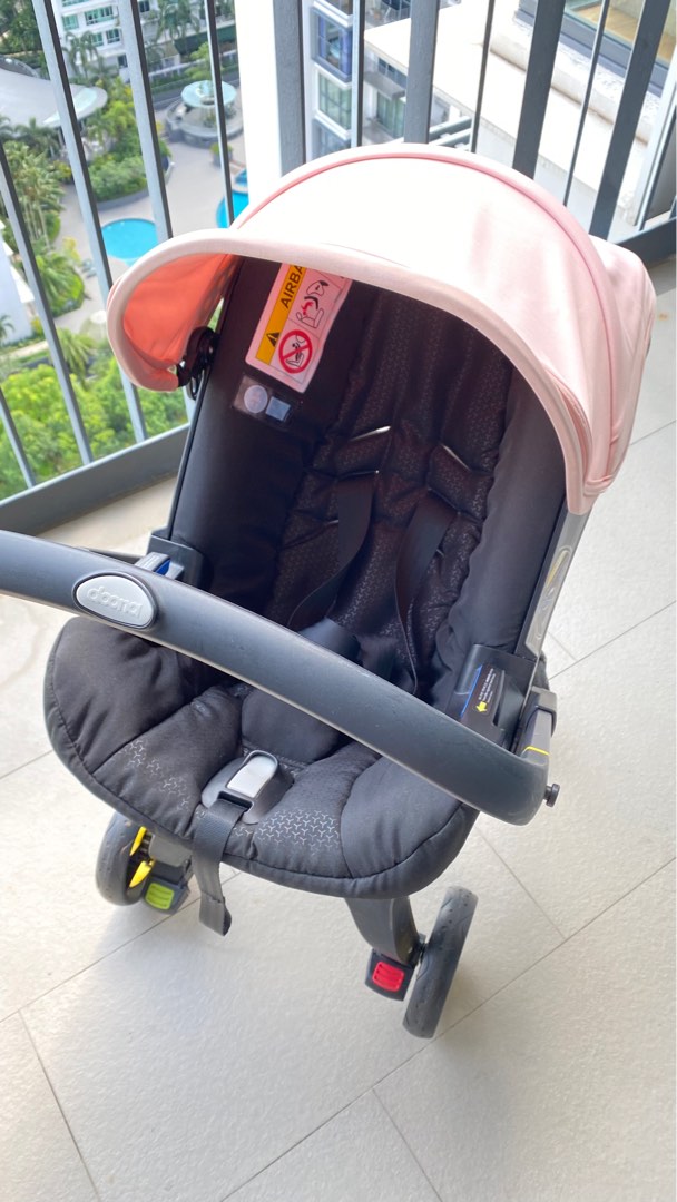 Pink Doona Infant Car Seat Stroller, Babies & Kids, Going Out ...