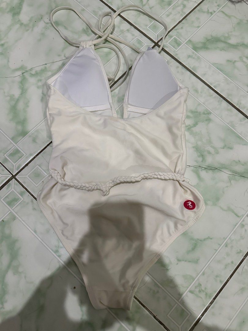 Folded and hung swimsuit, Women's Fashion, Swimwear, Bikinis ...