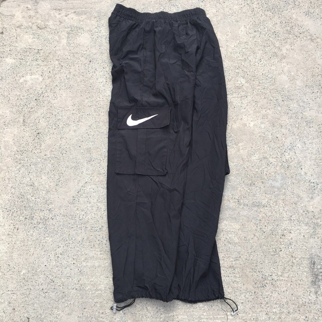 Nike parachute Pants black, Men's Fashion, Bottoms, Jeans on Carousell