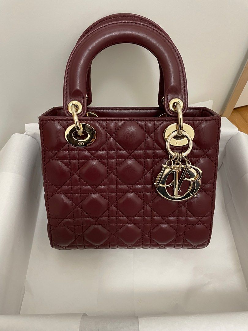 Lady dior small red wine, Luxury, Bags & Wallets on Carousell