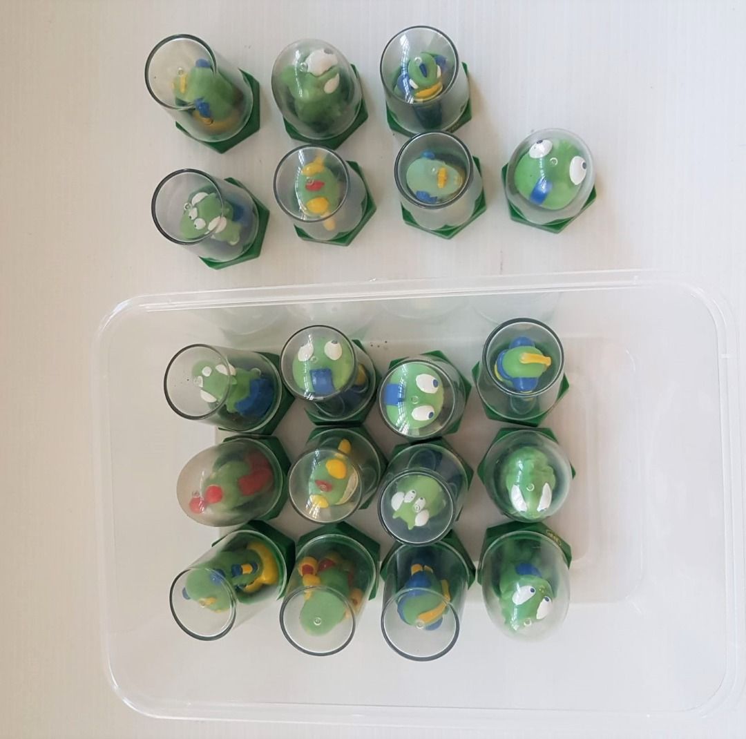 BP alien critters, BP Collectibles, Green Aliens, each in a capsule ...