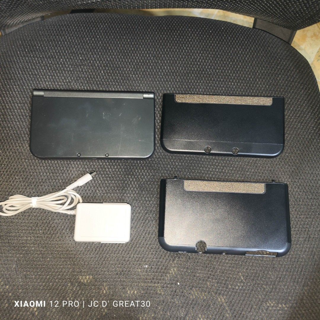New 3ds xl metallic black 64gb cfw (Full of games) bottom screen IPS on Carousell