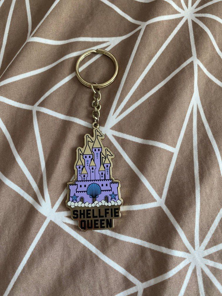 Typo gold seaside castle keychain, Hobbies & Toys, Toys & Games on ...