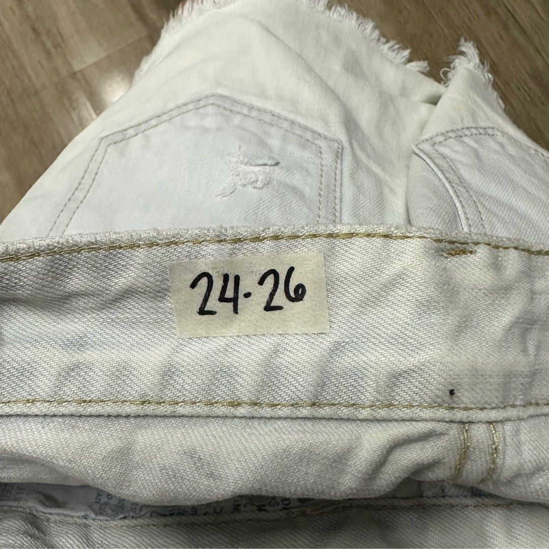 Light acid washed distressed tattered highwaist denim shorts on Carousell