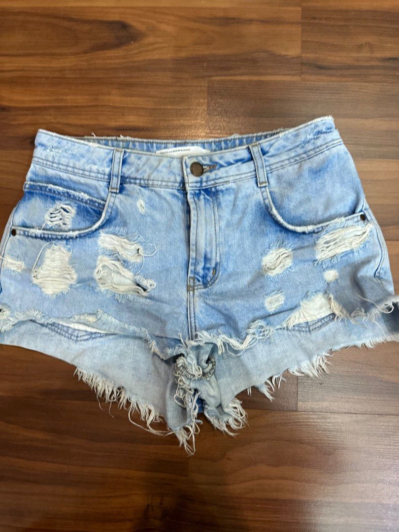 ZARA ripped light denim shorts on Carousell
