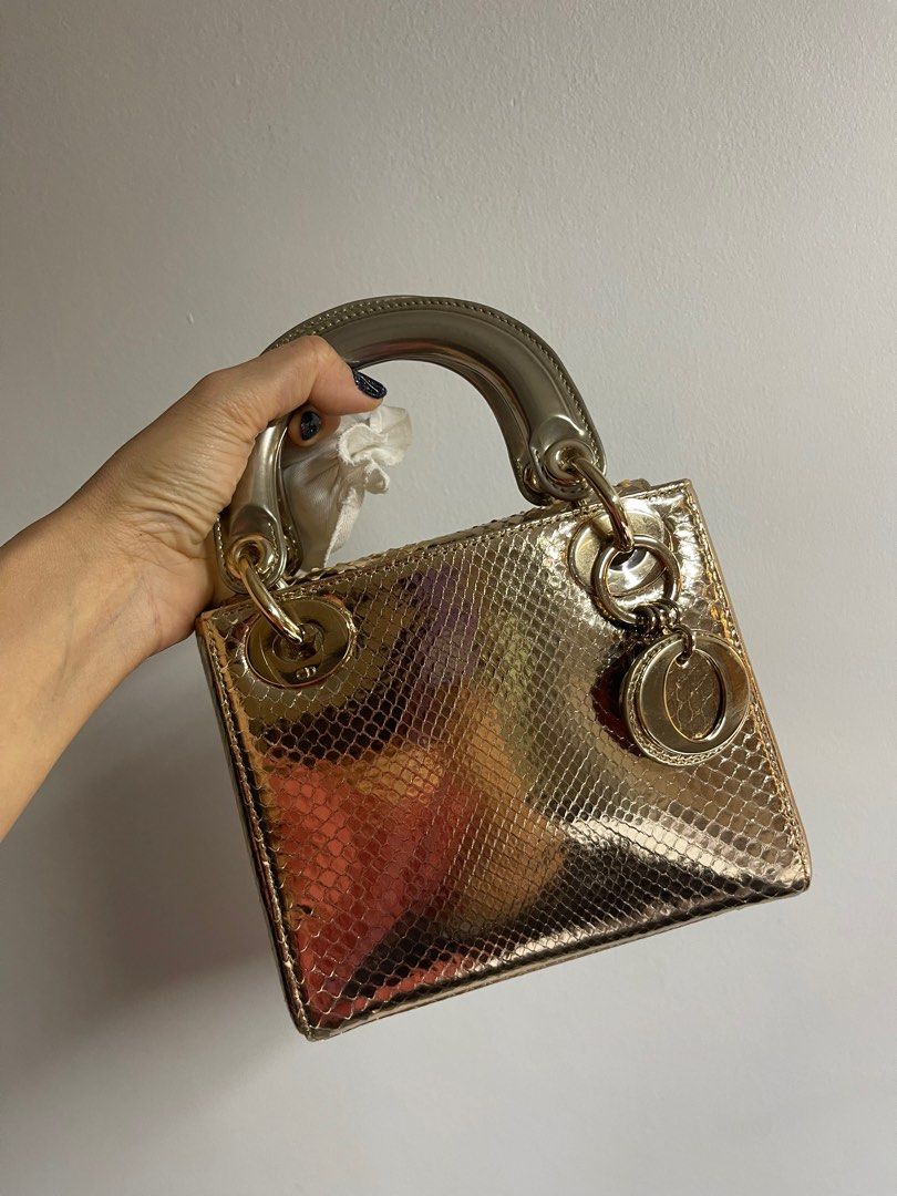 Gold python skin mini dior with strap, Luxury, Bags & Wallets on Carousell