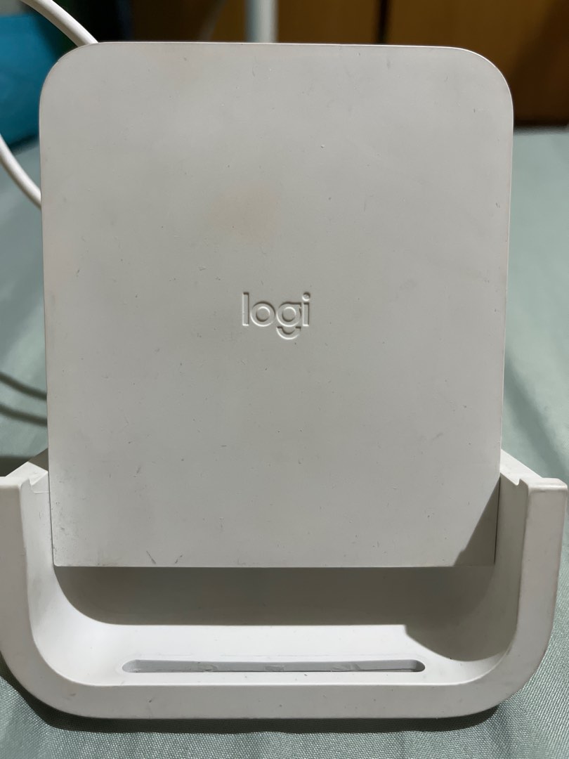 Logi powered wireless charging stand with adapter white on Carousell