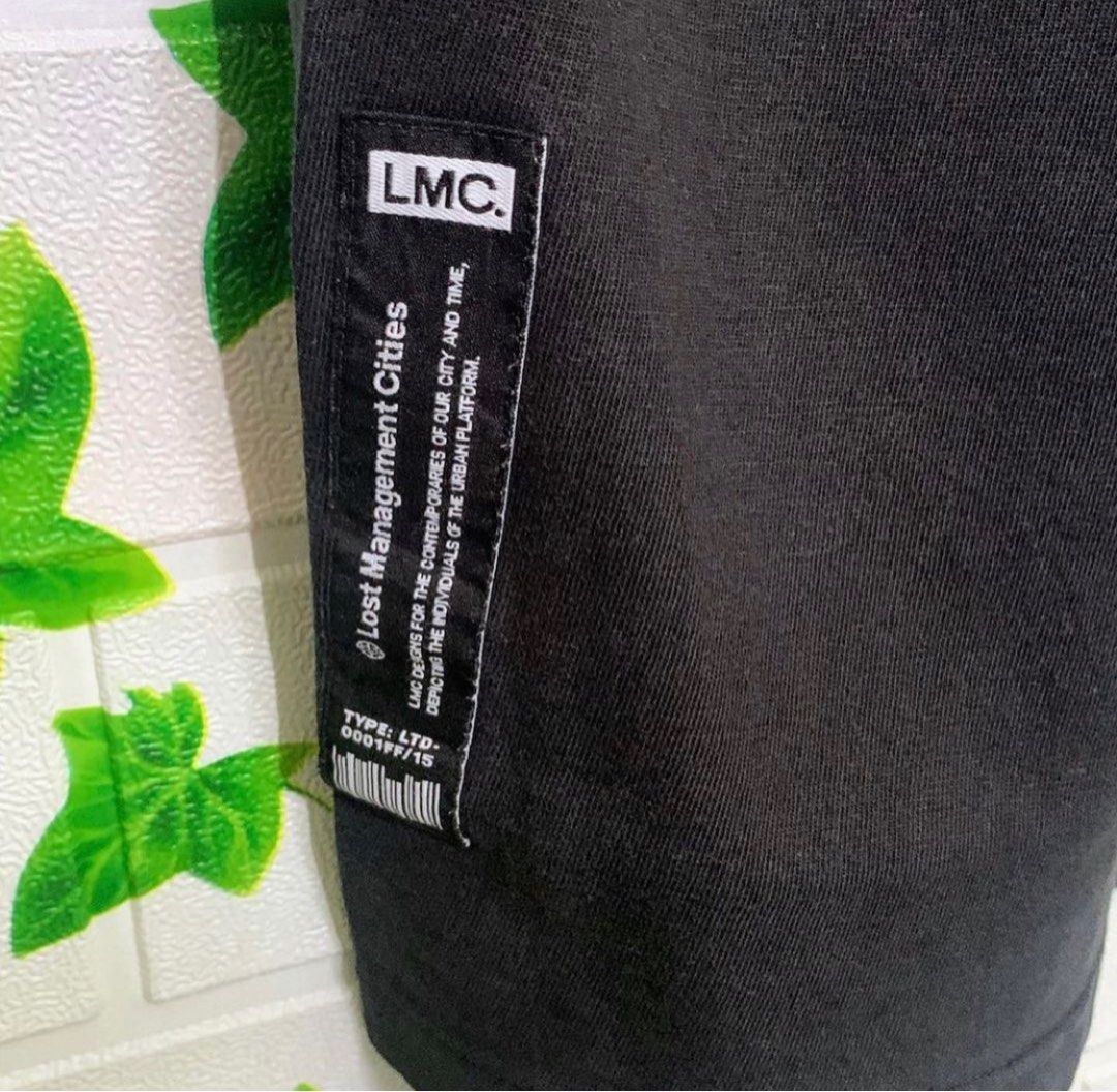 Lost Management Cities Oversize, Fesyen Pria, Pakaian , Atasan di Carousell