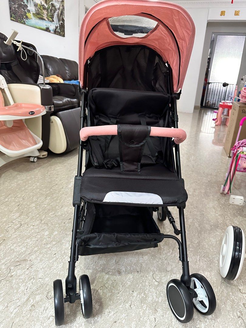 Cabin size Pink strollers light weight Used once only, Babies & Kids ...