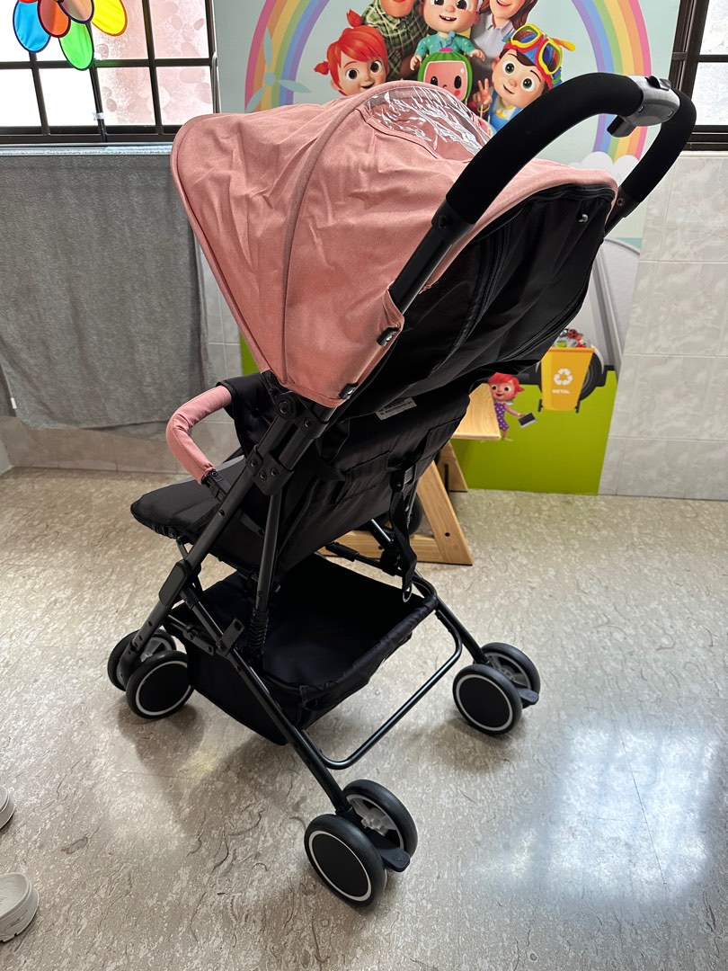 Cabin size Pink strollers light weight Used once only, Babies & Kids ...