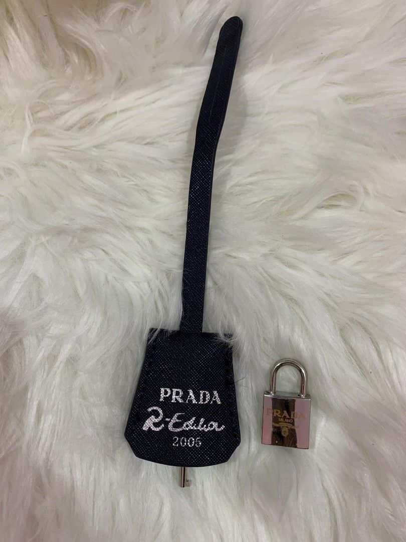 Prada lock and key with key holder on Carousell
