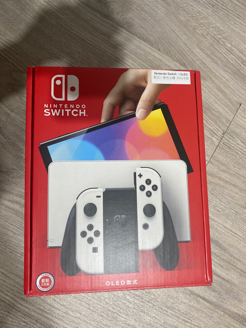 Switch OLED 電力加強版（含遊戲片-終極風暴幕留人傳）, 電玩遊戲相關, 電玩主機, Nintendo 任天堂在旋轉拍賣