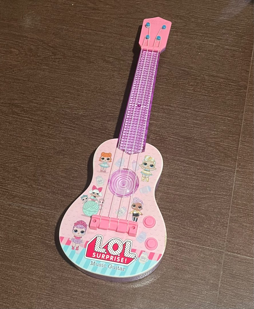 LOL guitar (preloved), Hobbies & Toys, Toys & Games on Carousell