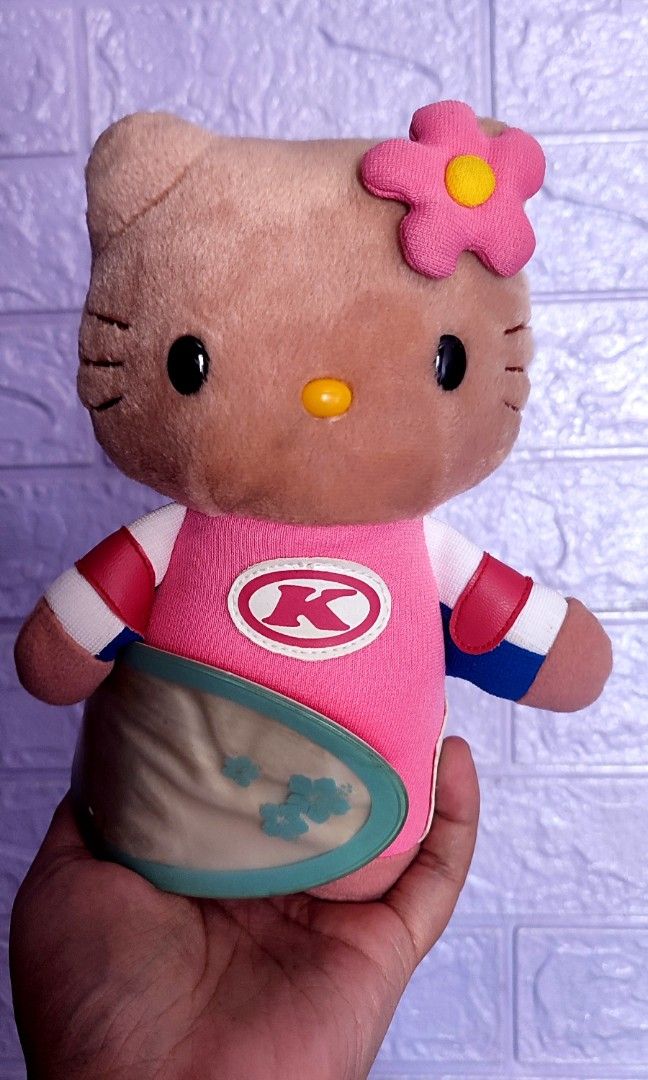 Hello Kitty Tan surfer on Carousell