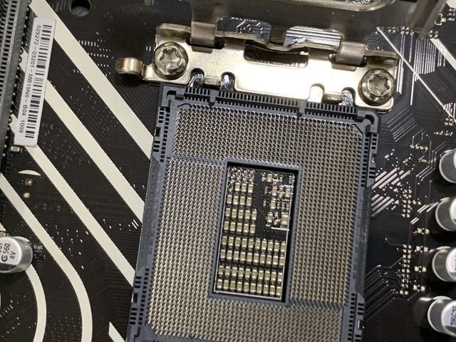 ASUS motherboard with one bent pin in CPU socket. (ASUS H610M-E D4 ...