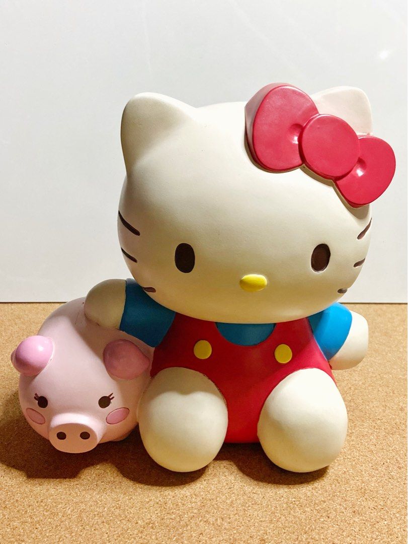 Big Resin Hello Kitty with piggy bank, coin bank on Carousell