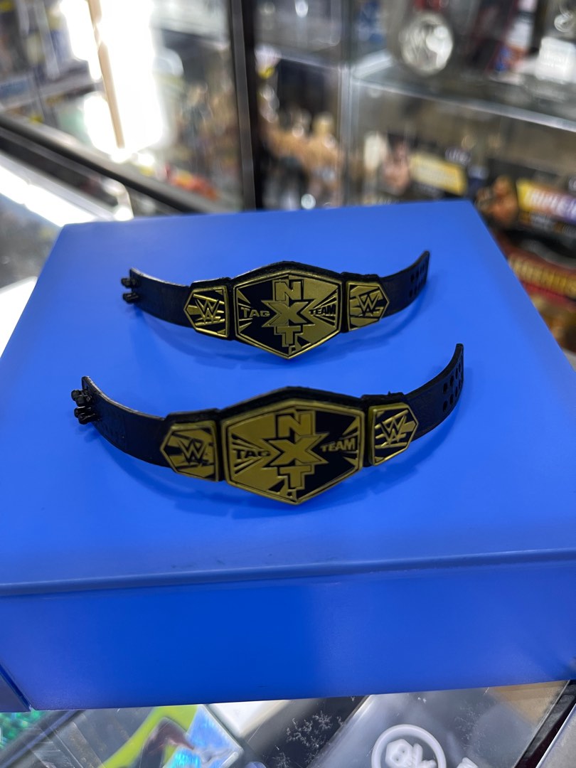WWE Mattel NXT Tag Team Figure Belt Set of Two on Carousell