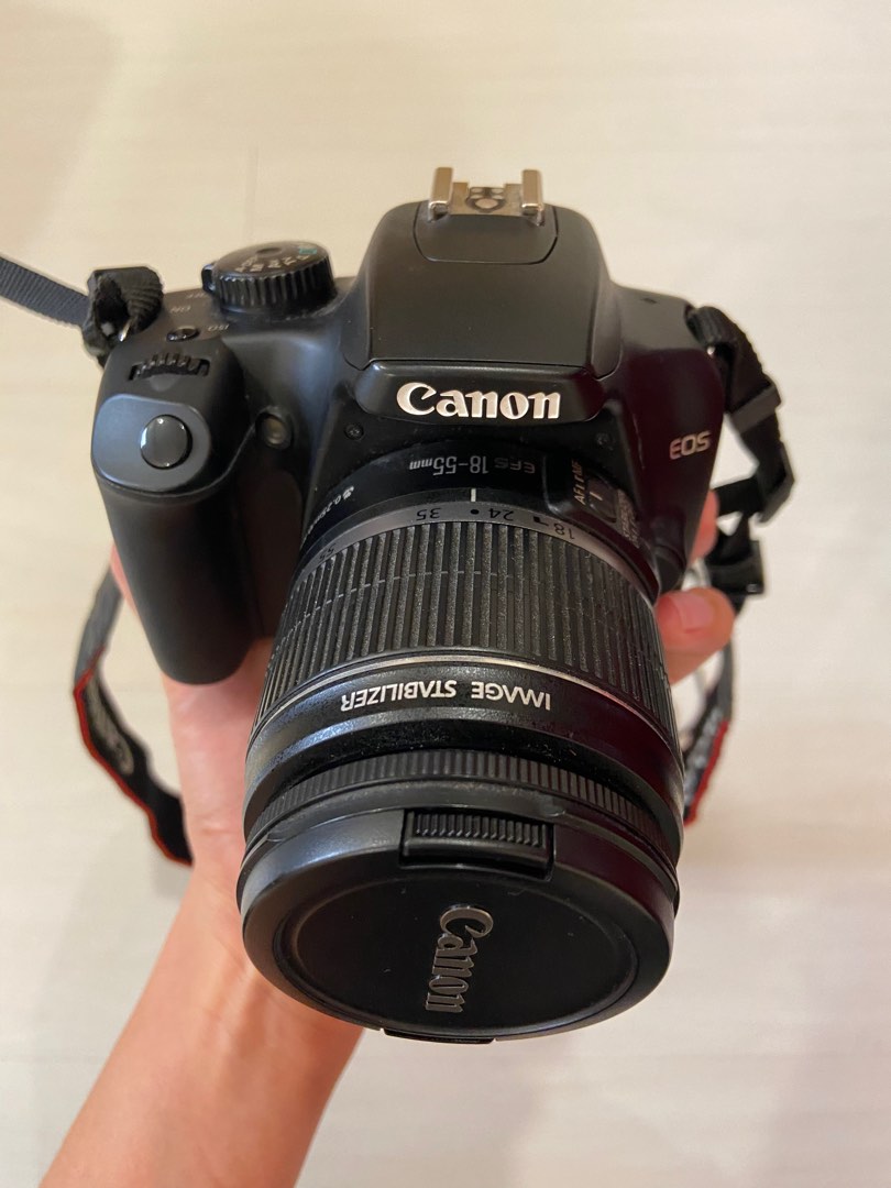 Canon EOS 1000D DSLR Camera with Lens on Carousell