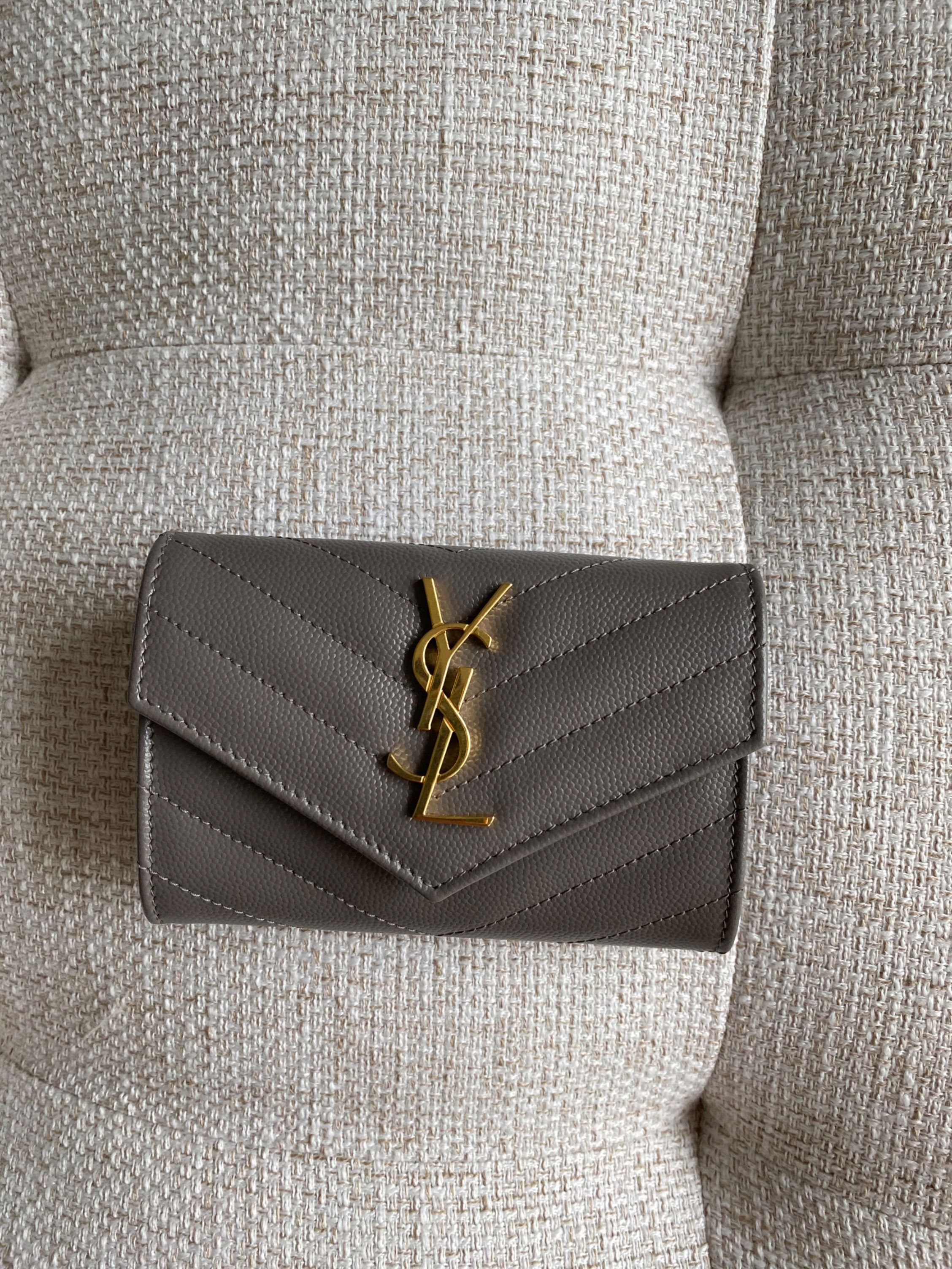 YSL Cassandre envelope wallet, Luxury, Bags & Wallets on Carousell