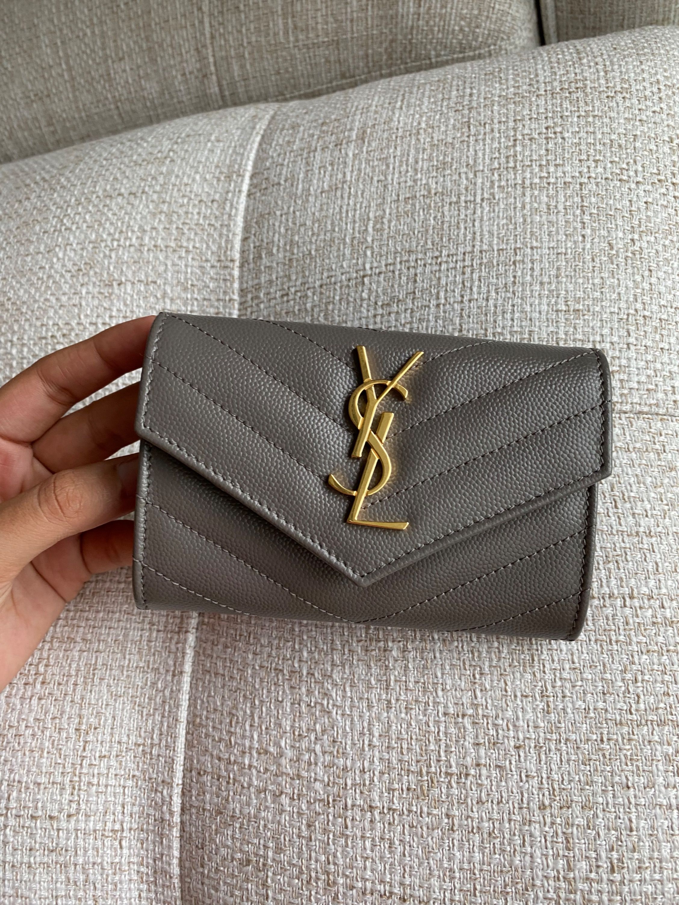 YSL Cassandre envelope wallet, Luxury, Bags & Wallets on Carousell