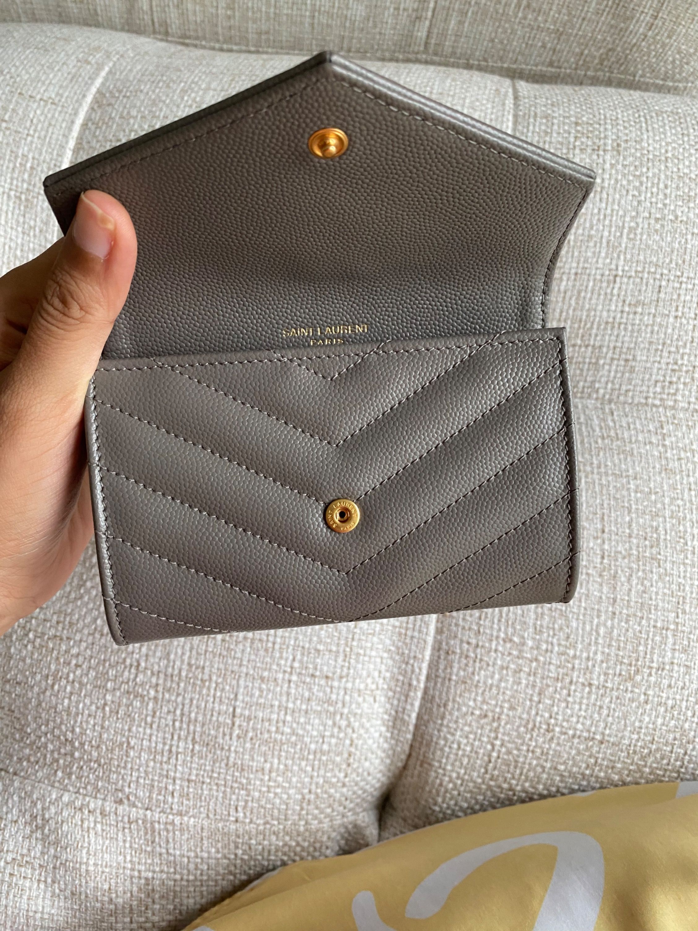 YSL Cassandre envelope wallet, Luxury, Bags & Wallets on Carousell