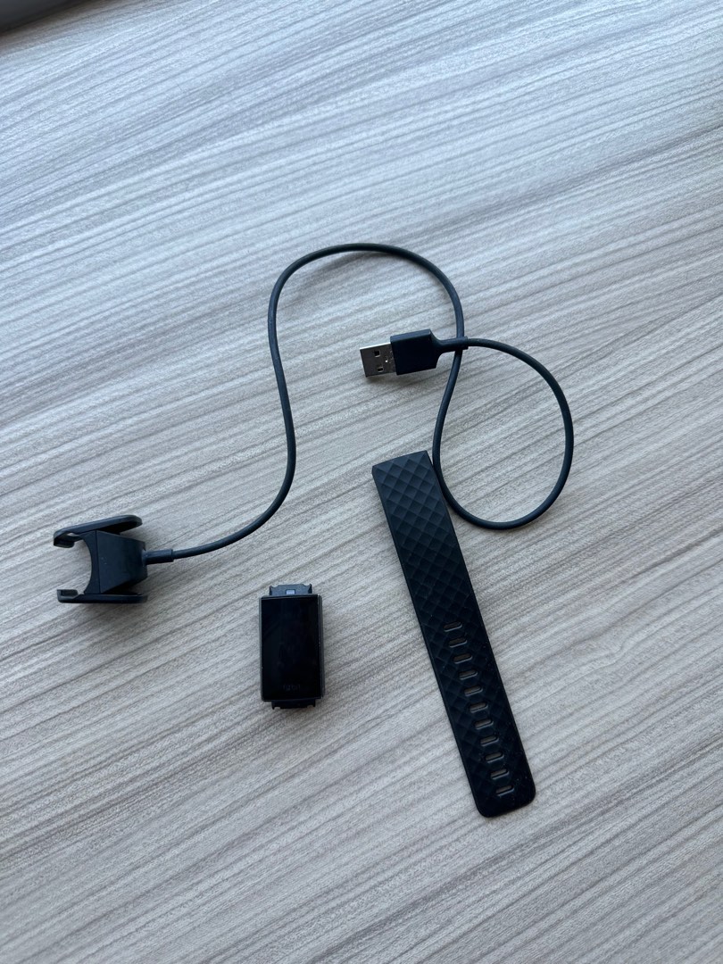 Fitbit Charge 3 with charger and one side of strap, Mobile Phones ...