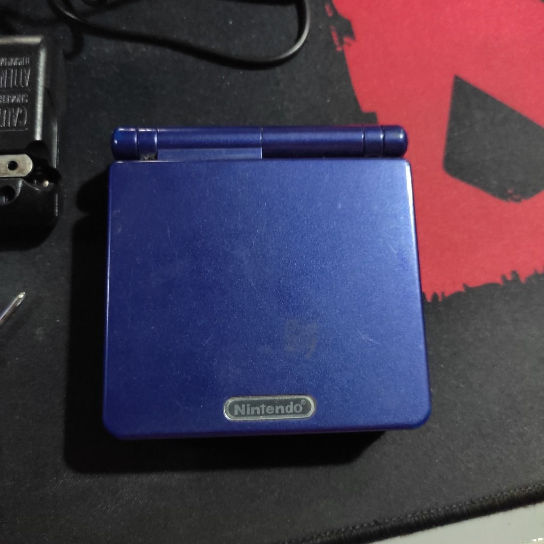 Gameboy Advance SP With Games and Charger on Carousell