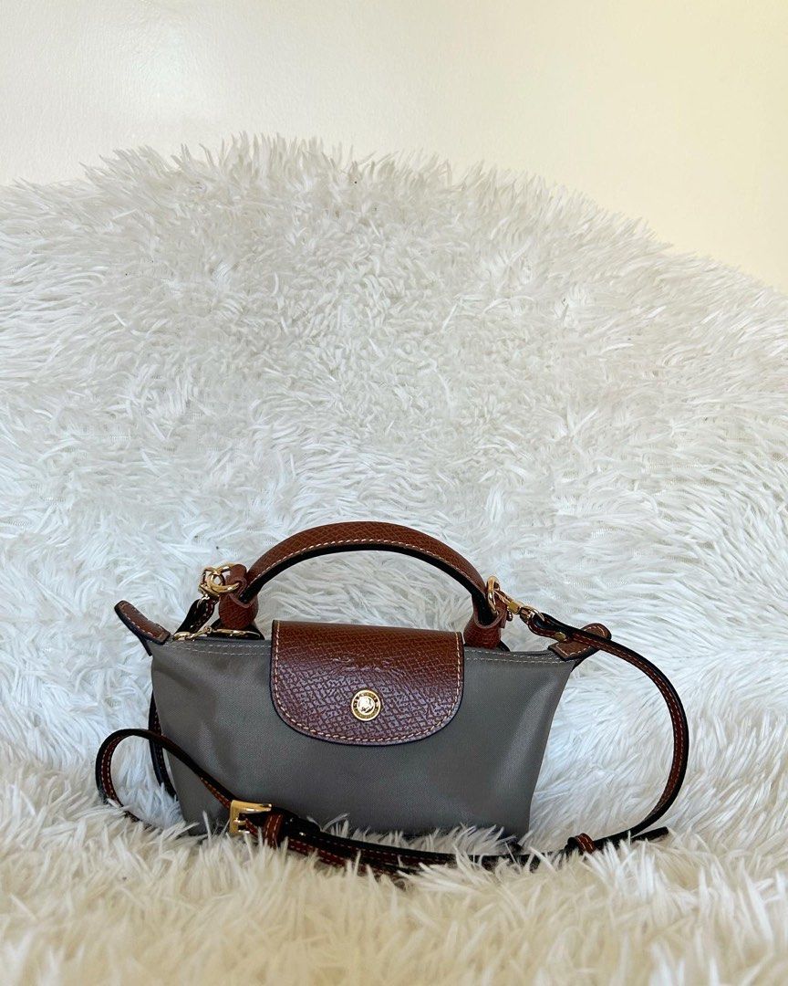 longchamp pouch with strap in grey color on Carousell