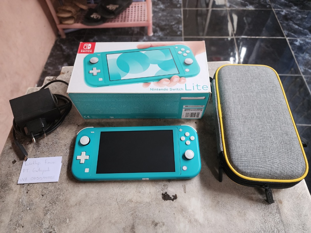 Nintendo Switch Lite Turquoise Fullset 128GB CFW Atmos 01 on Carousell