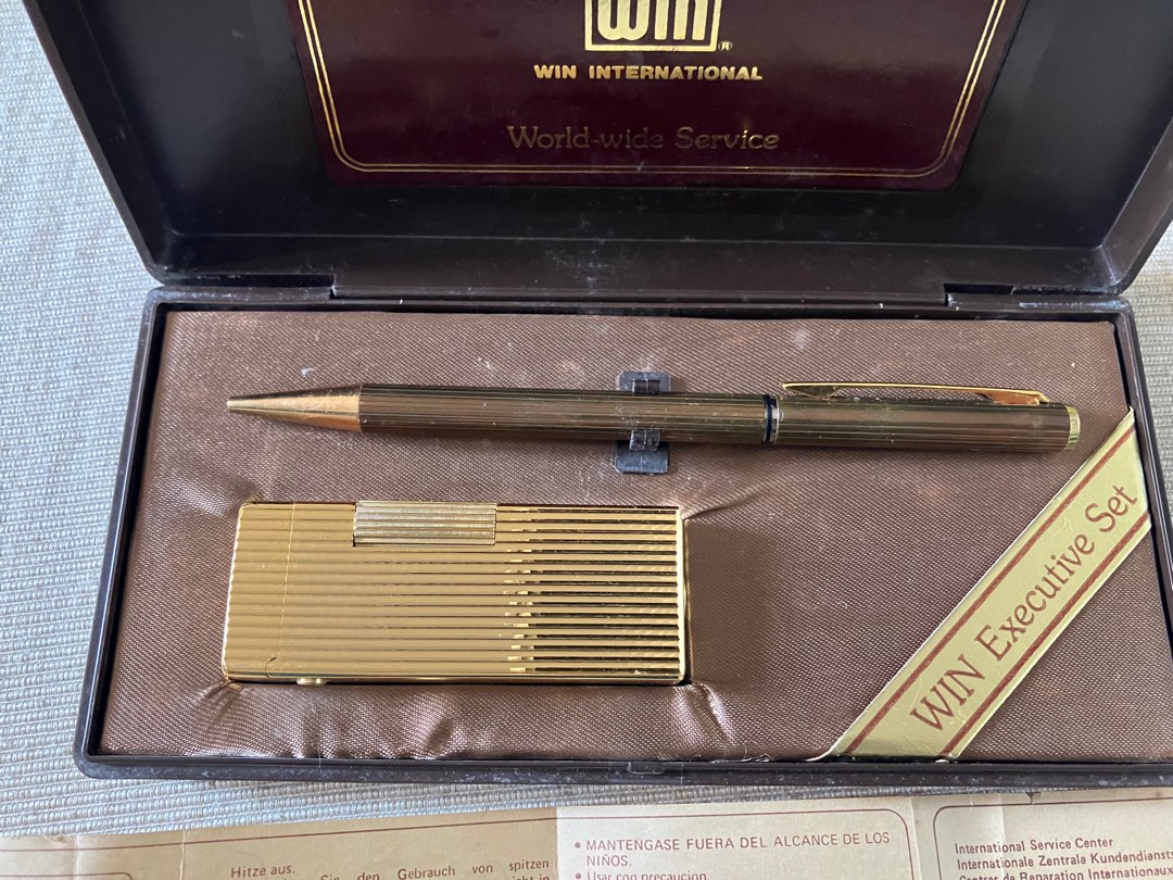 Win International vintage lighter and pen on Carousell