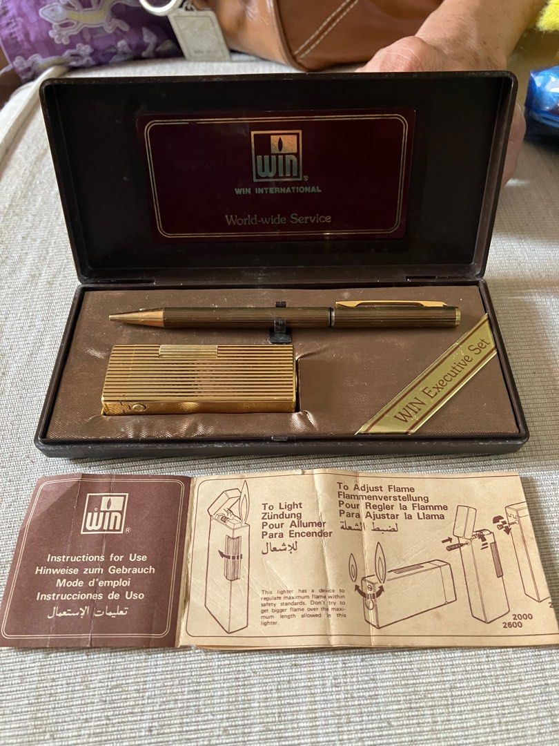 Win International vintage lighter and pen on Carousell