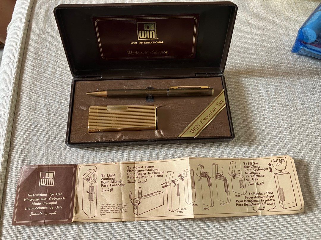 Win International vintage lighter and pen on Carousell