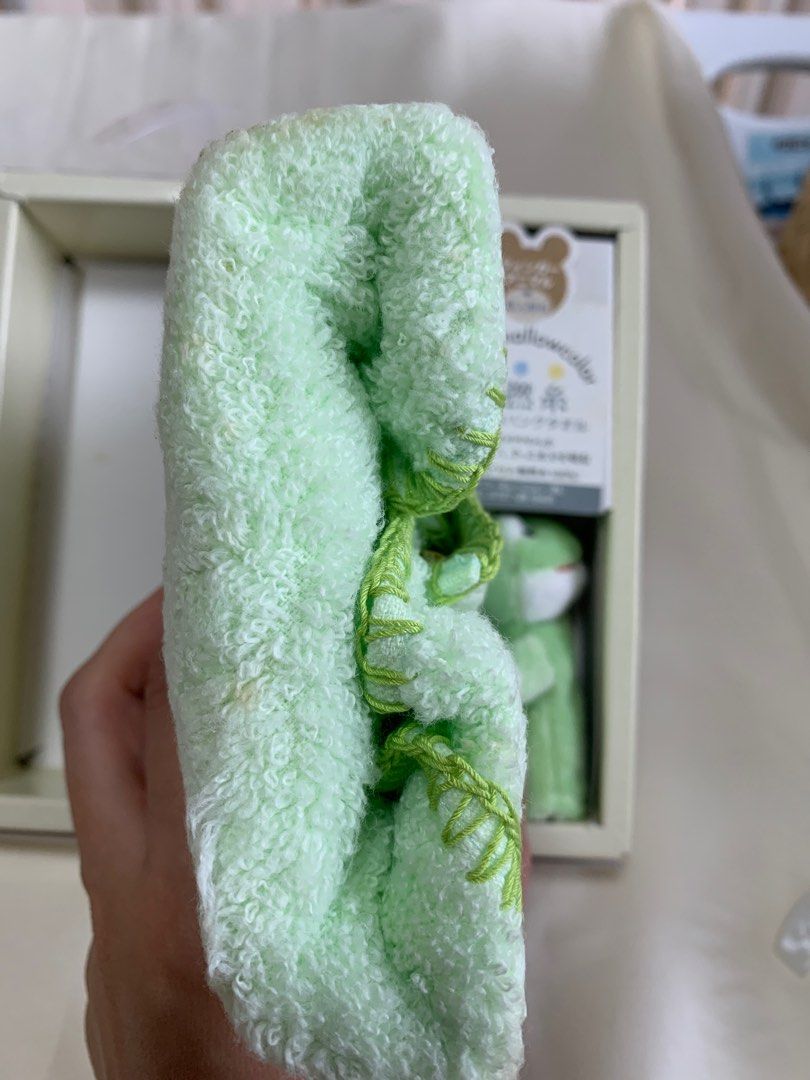 face towel and finger puppet frog on Carousell