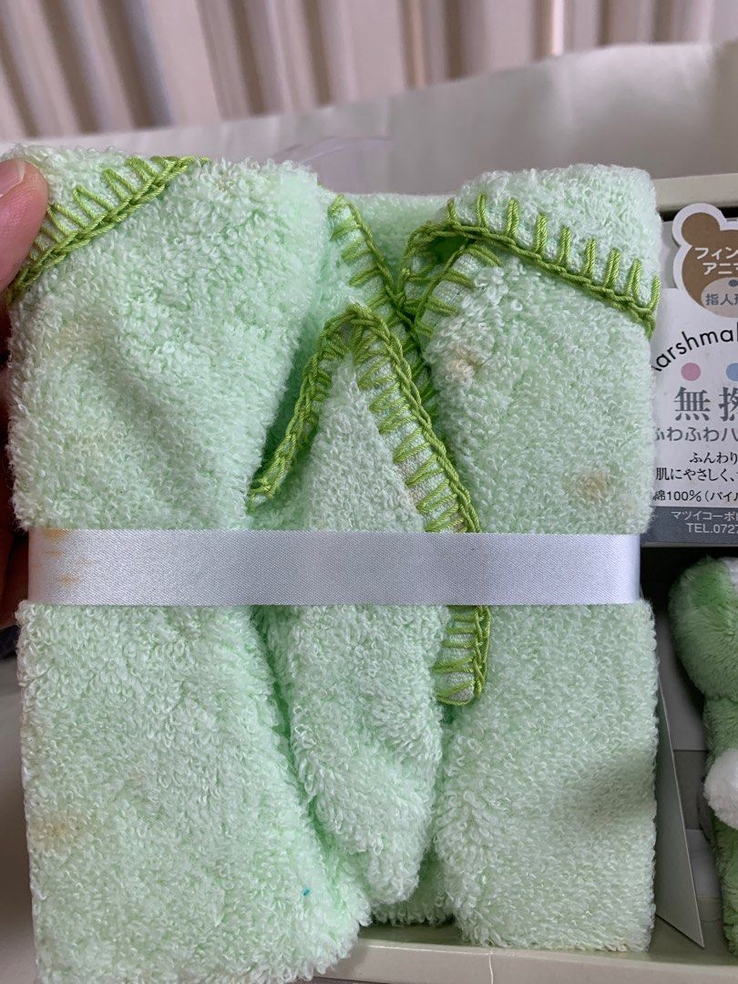 face towel and finger puppet frog on Carousell