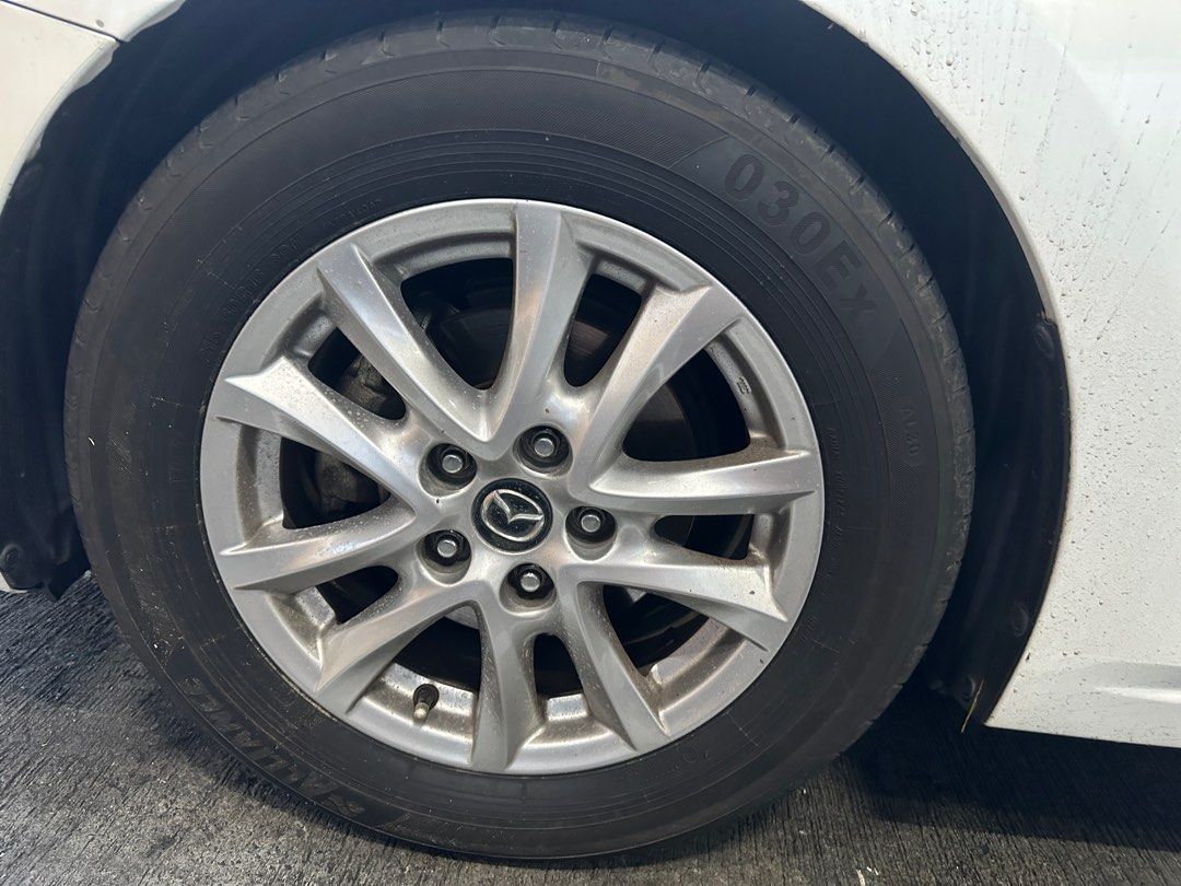 Mazda 3 Stock Mags 16” with almost new Tires (215/60/16) on Carousell