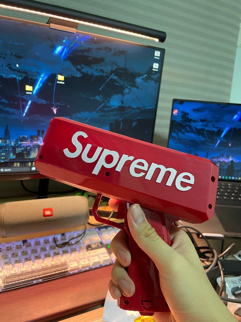Supreme Money Gun, Hobbies & Toys, Toys & Games on Carousell