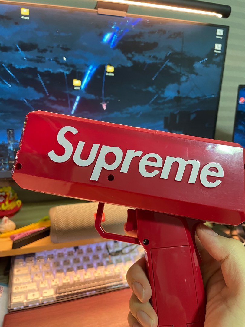 Supreme Money Gun, Hobbies & Toys, Toys & Games on Carousell