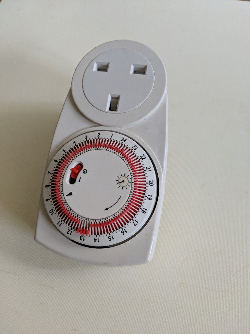 Mains power outlet timer. Working white color with on/off and automatic ...