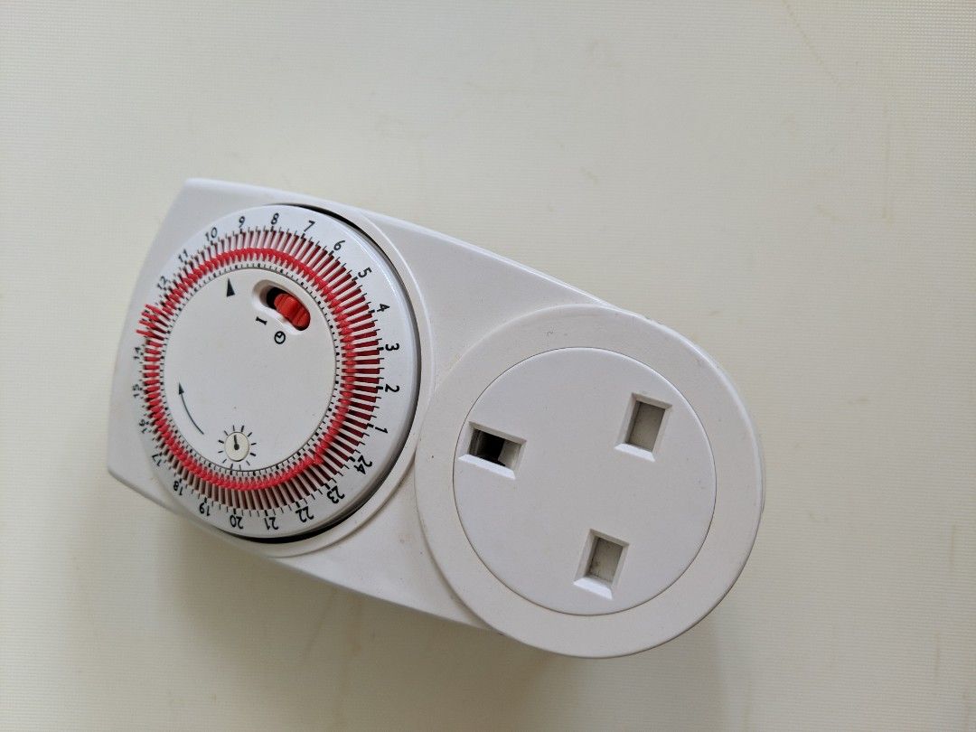 Mains power outlet timer. Working white color with on/off and automatic ...