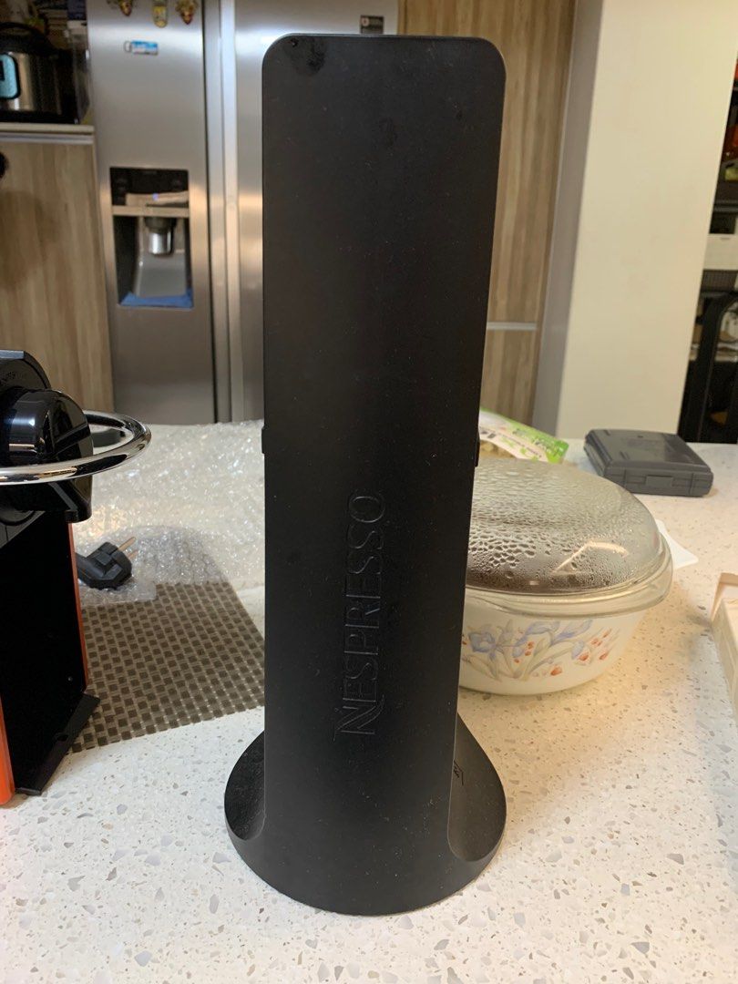 Nespresso Pixie Machine with FREE capsule dispenser) on Carousell